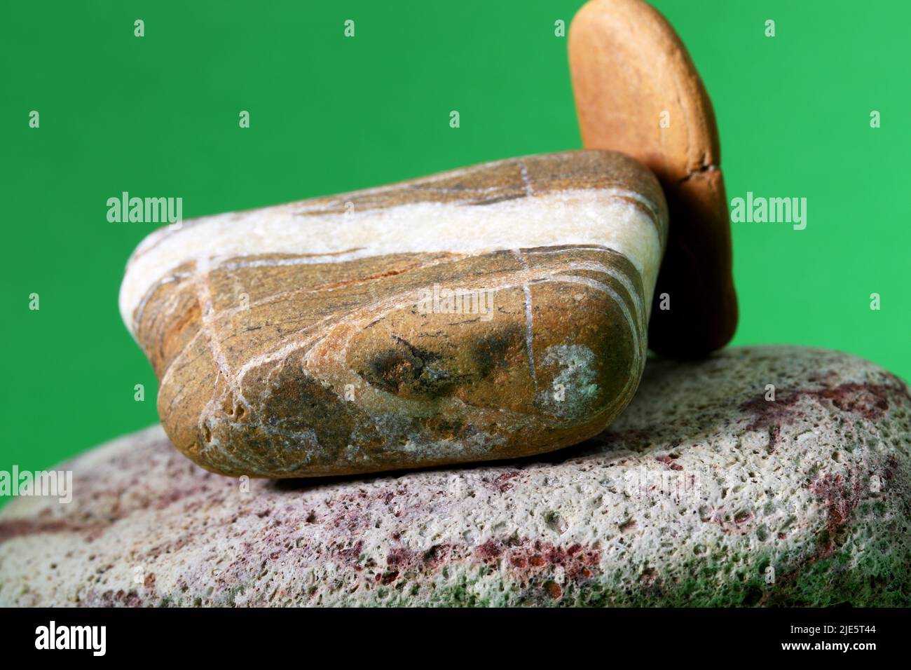 close-up natural stone texture on green background Stock Photo - Alamy