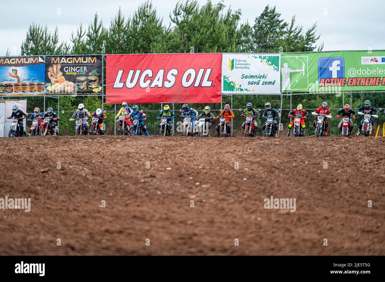 Dobele, Latvia, June 18, 2022: group of motocross riders in action ...