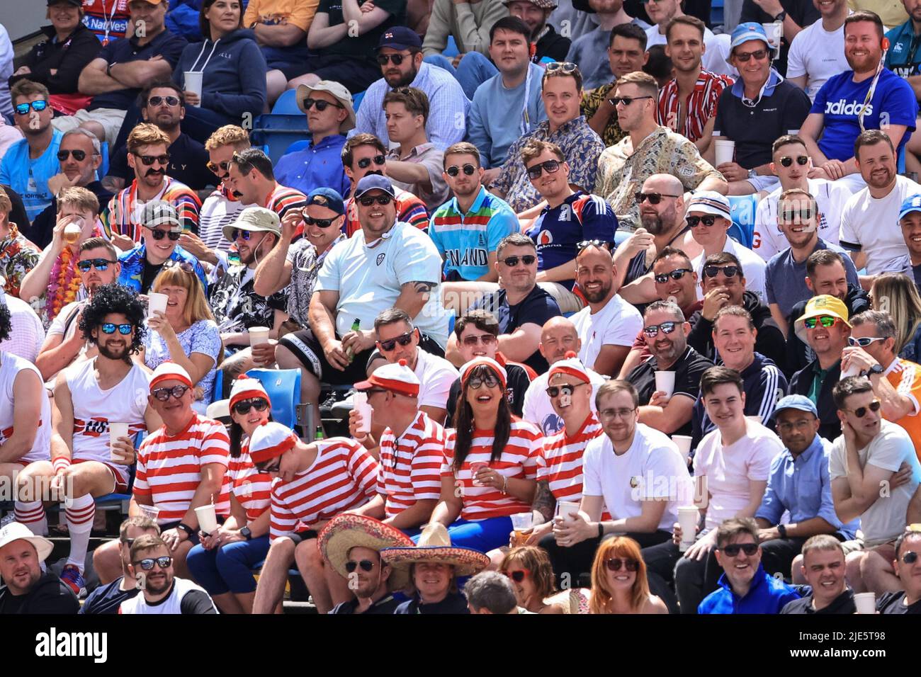 Fans dressed up as Where's Wally watch on in Leeds, United Kingdom on 6 ...