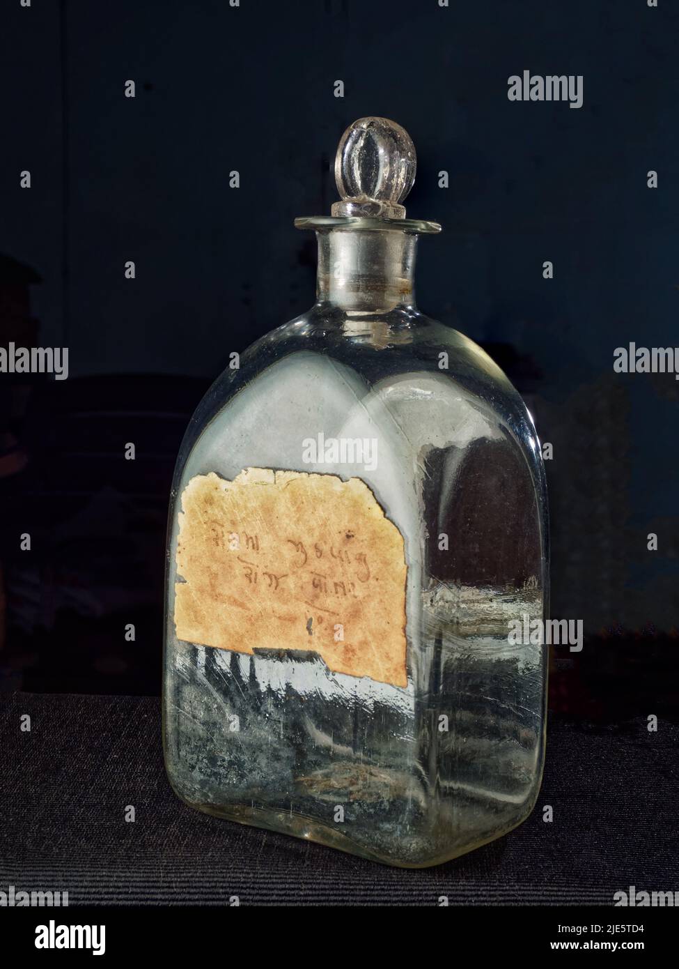 06 24 2022 Vintage pontil type bottle on dark backdrop studio shot ...
