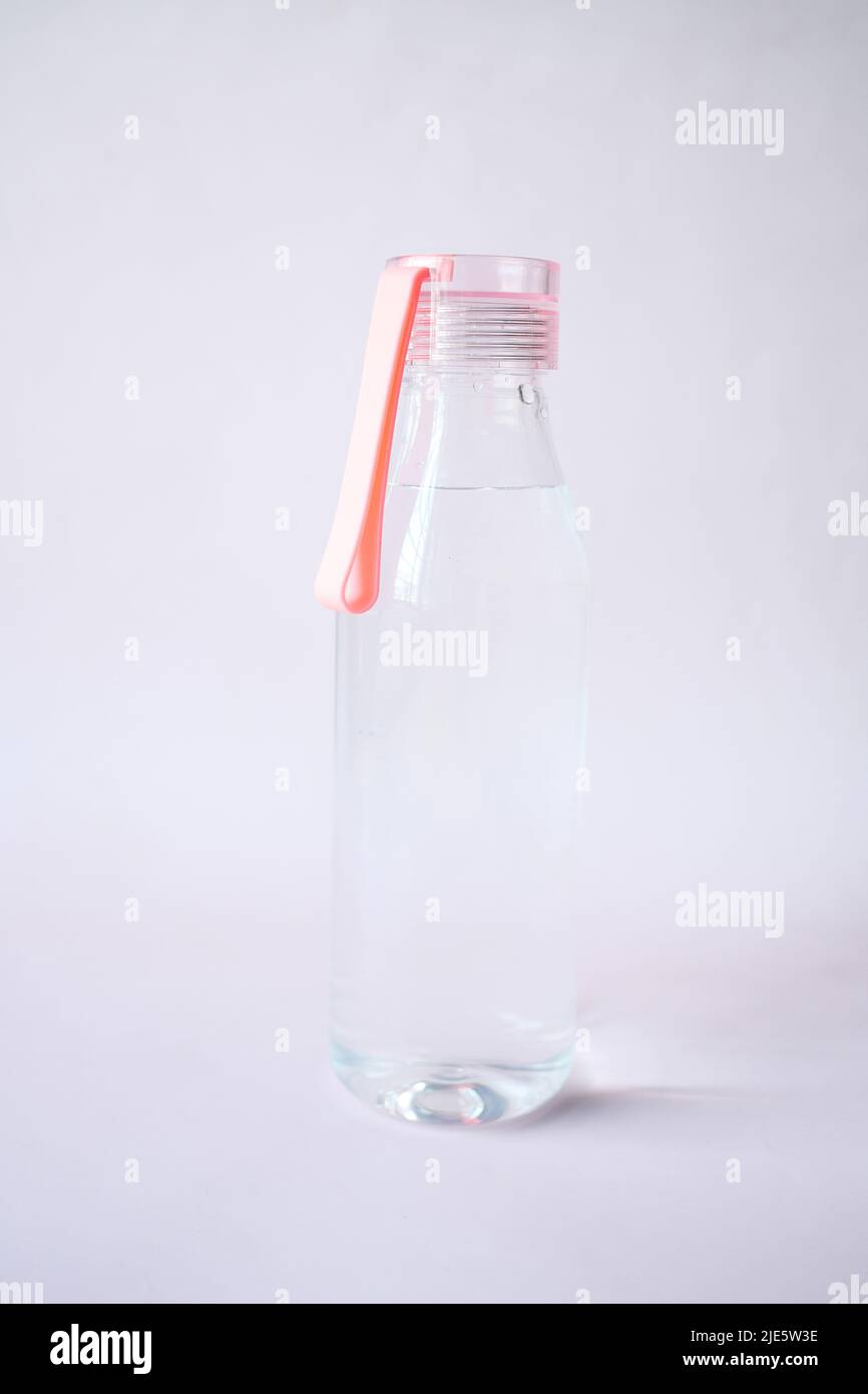 fresh drinking water in a pink color bottle Stock Photo - Alamy