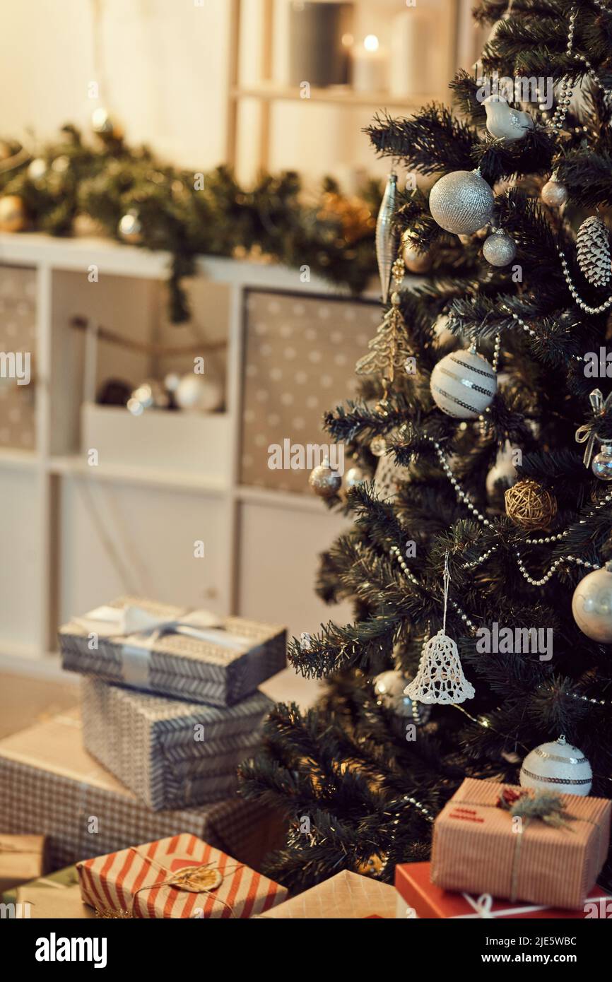 Interior of living room with beautiful Christmas tree decorated with ...