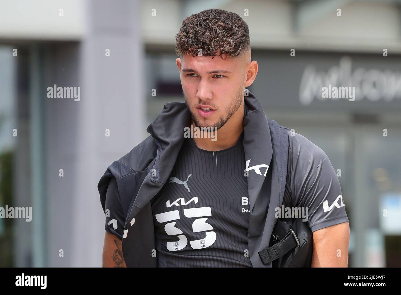 Matty Wolfe #33 of Barnsley arrives at Sandy Lane Stadium ahead of this ...