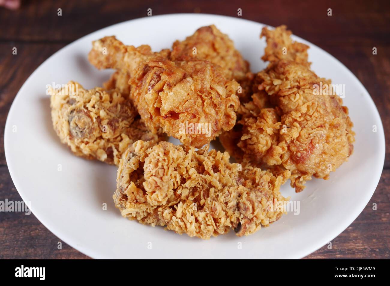 Crispy fried chicken on a plate top view Stock Photo - Alamy