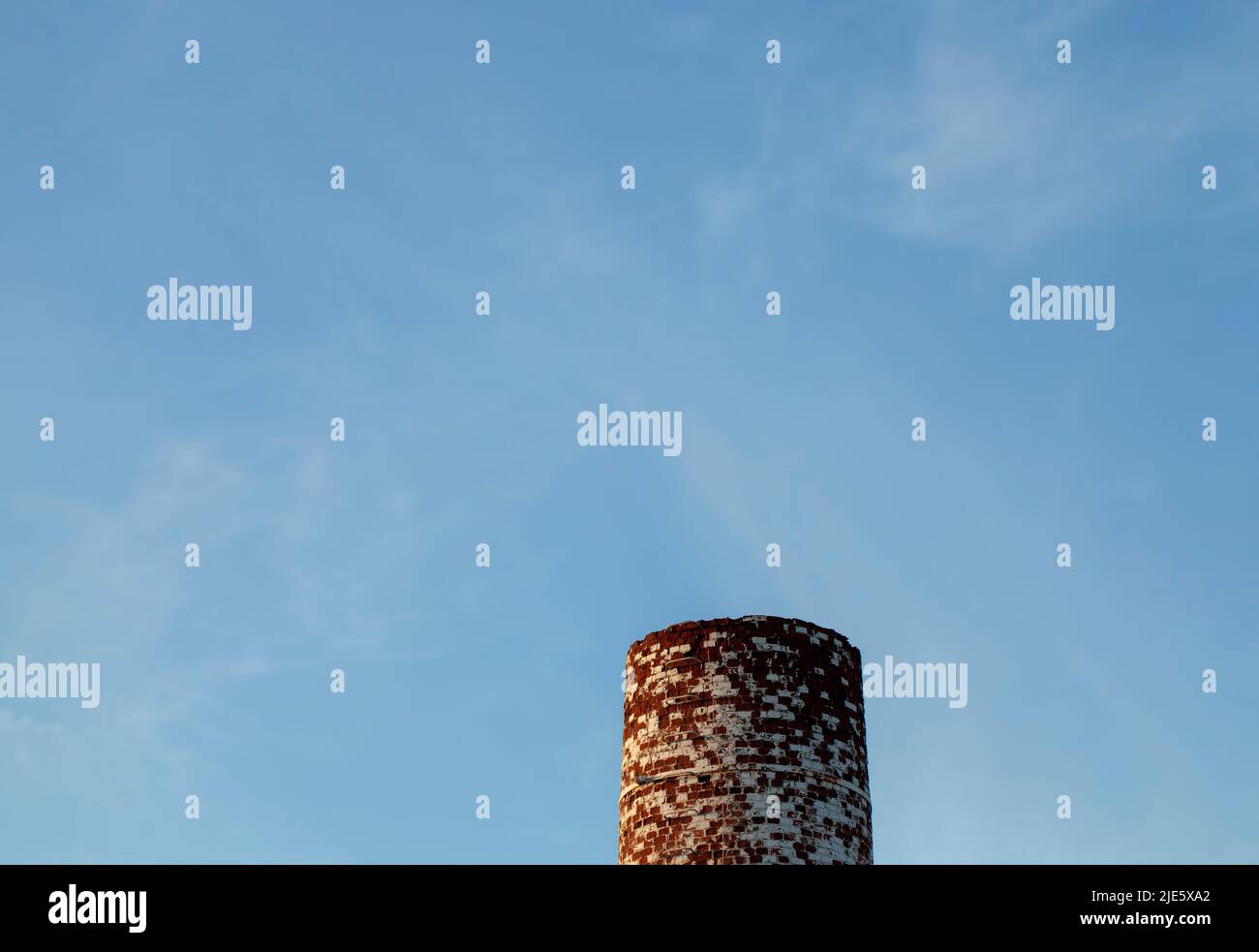 old chimney on the roof of the building, old heating system with a ...