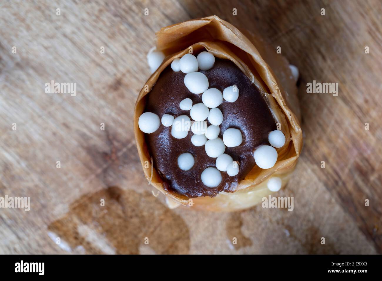 sweets made of thin puff pastry with chocolate filling and honey ...
