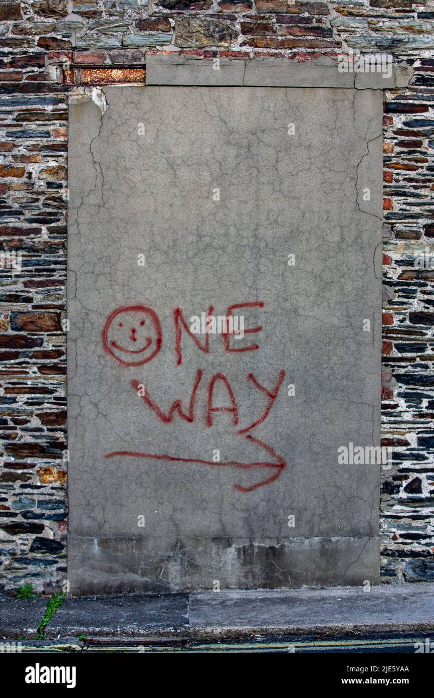 Cool image of a back street wall with a bricked up and rendered opening ...