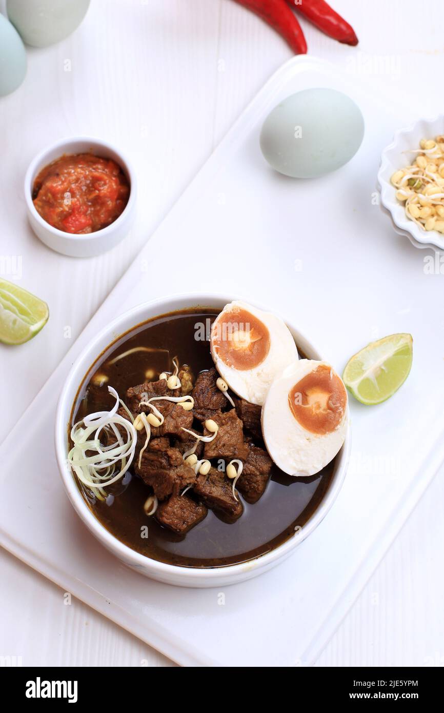 Top View Rawon, Indonesian Beef Black Soup Dish. Black Color Made from ...