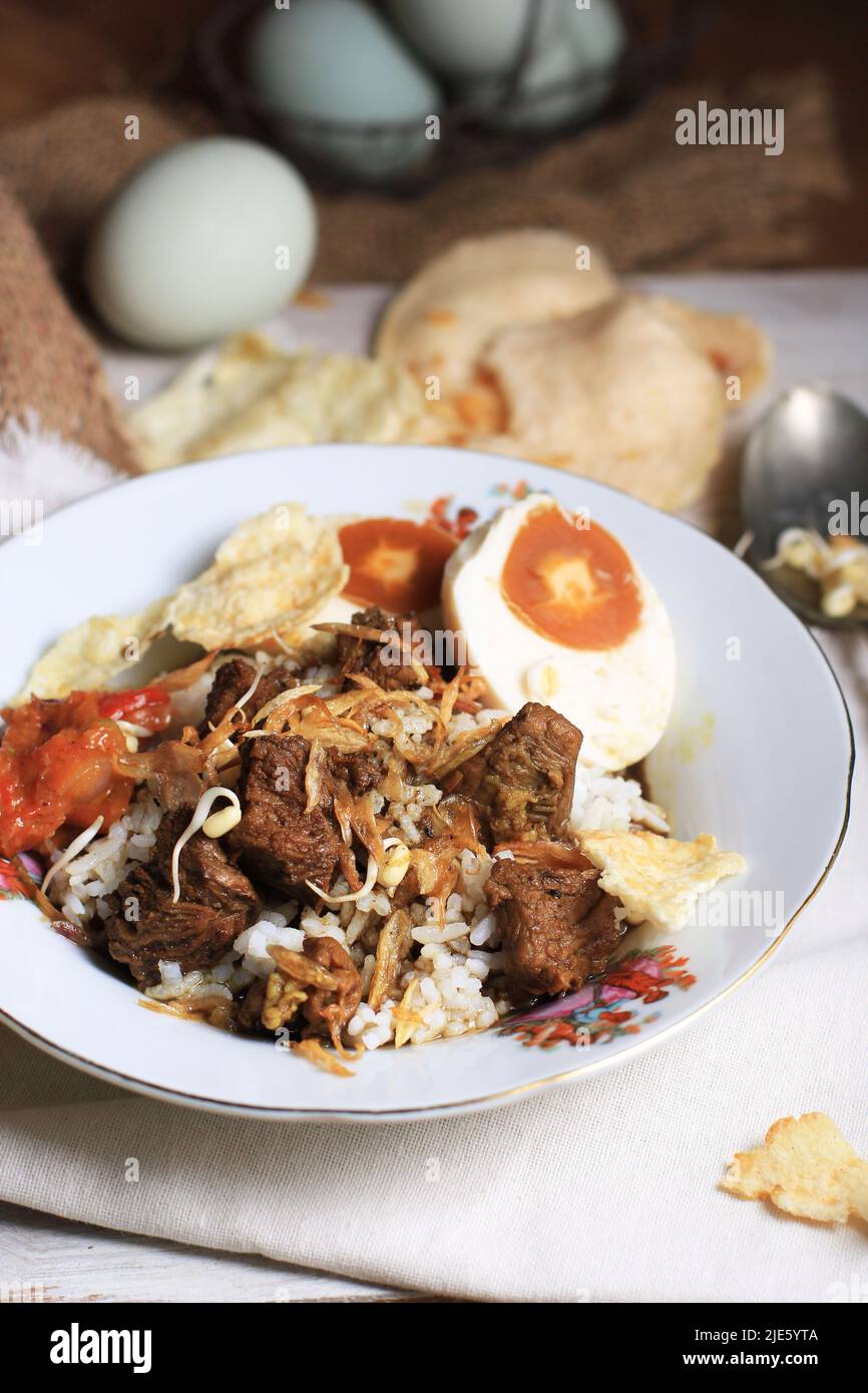 Rawon or Nasi Rawon (Rawon Rice) is a strong rich tasting traditional ...
