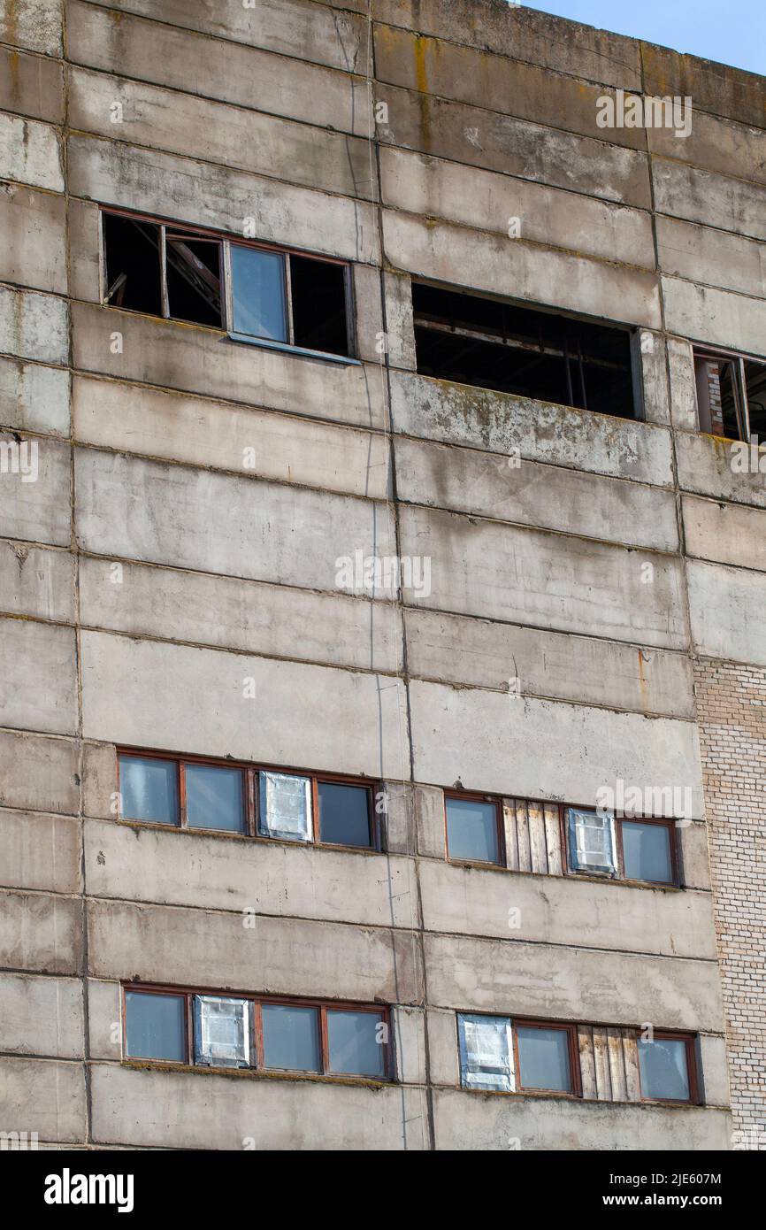 part of an old industrial warehouse with windows, part of an old ...