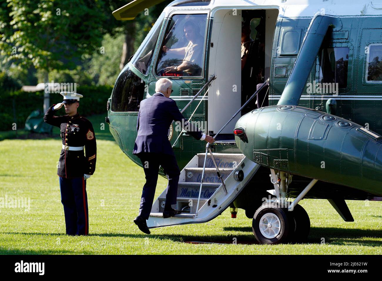 U.S. President Joe Biden boards Marine One helicopter on the South Lawn ...
