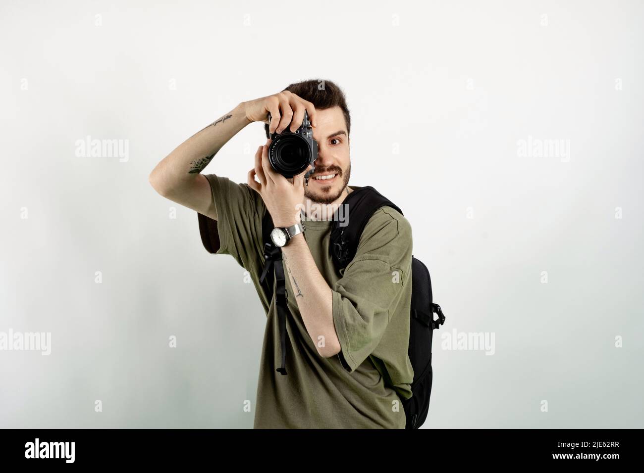 Cheerful caucasian man wearing casual clothes posing isolated over ...