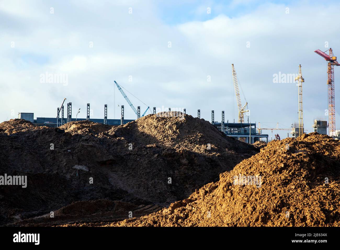 construction of a new building, a construction site on which a new ...