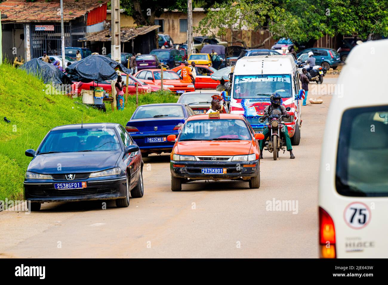 Daily life, people on the streets in Ivory Coast, Cote d'Ivoire, de ...