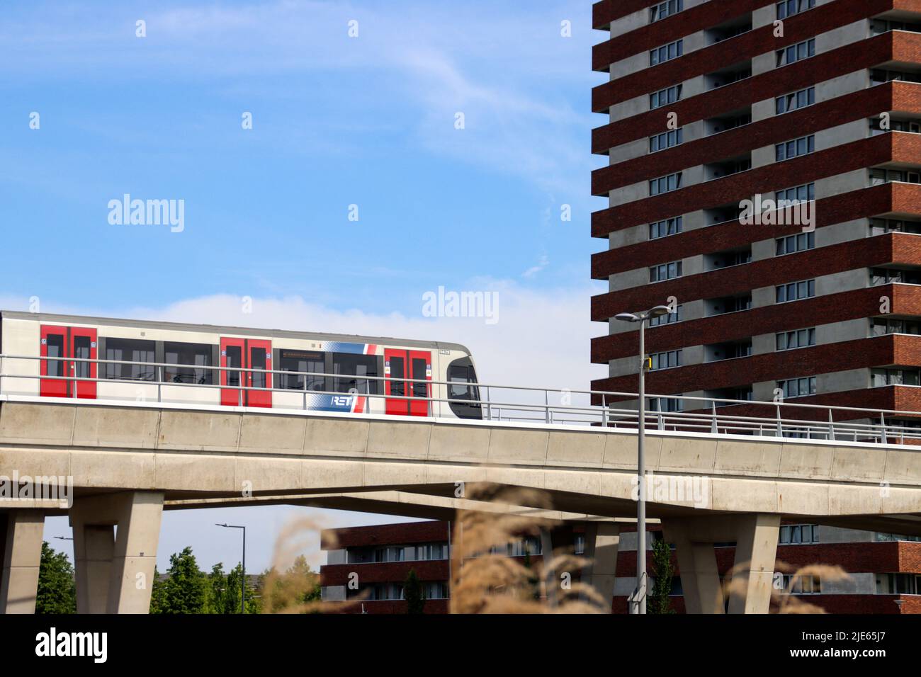 Subway train of the RET leaving the Rotterdam Nesselande Station in the ...