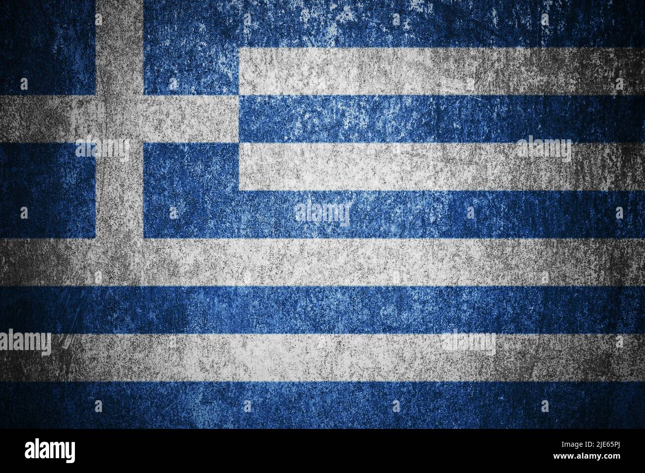 Closeup of grunge Greek flag. Dirty Greece flag on a metal surface ...