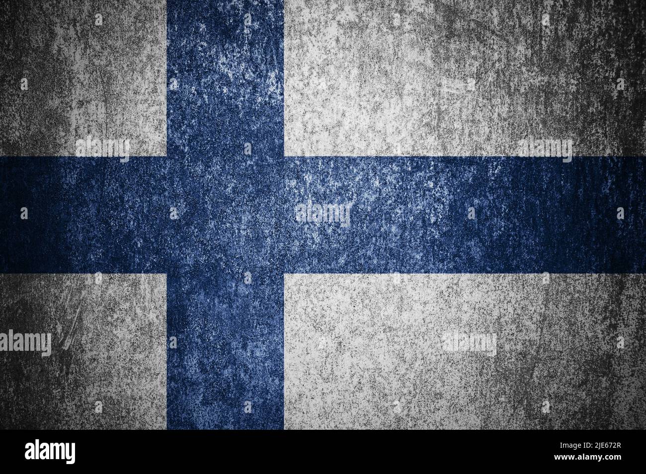 Closeup of grunge Finnish flag. Dirty Finland flag on a metal surface ...