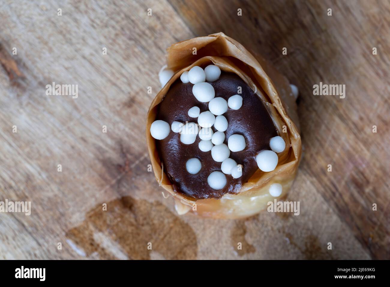 sweets made of thin puff pastry with chocolate filling and honey ...