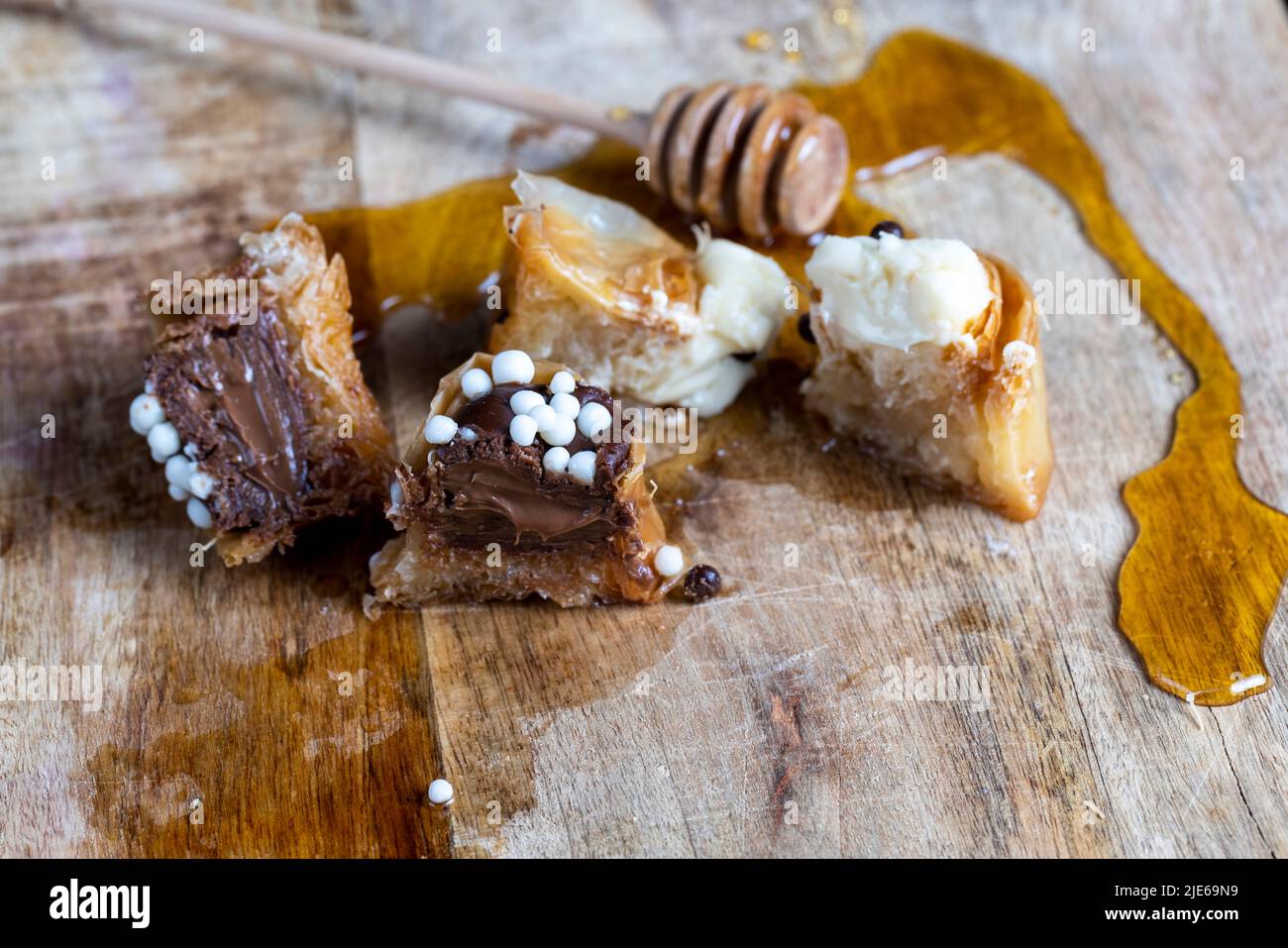 sweets made of thin puff pastry with chocolate filling and honey ...
