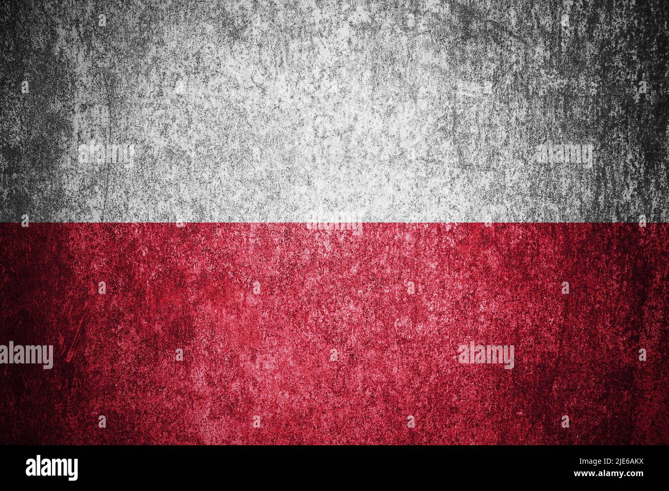 Closeup of grunge Polish flag. Dirty Poland flag on a metal surface ...