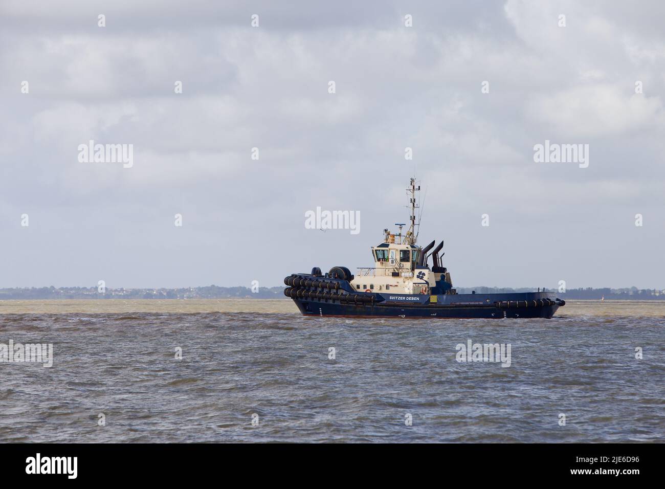 Tugboat Svitzer Deben on her way to meet and escort/assist a container ...