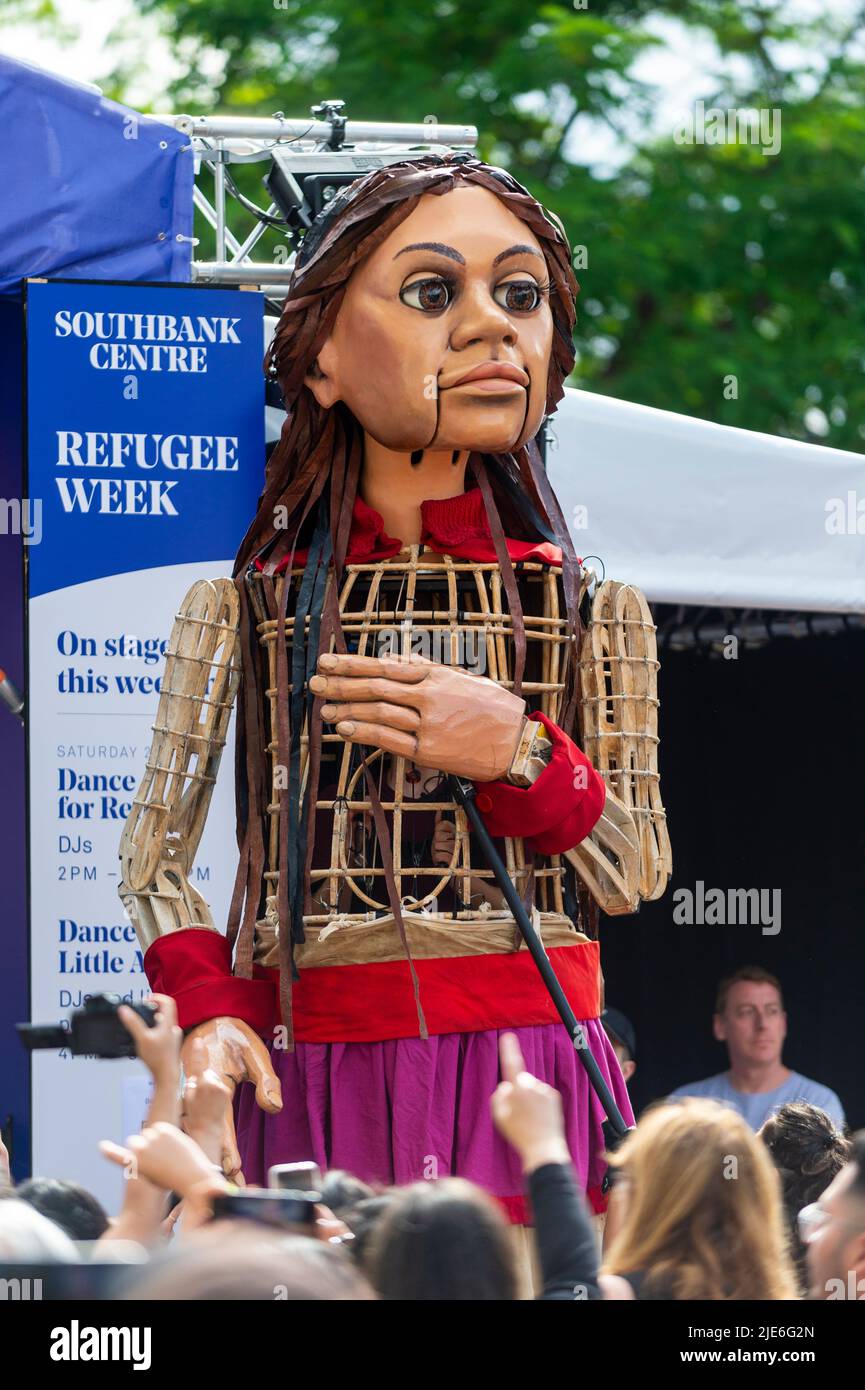 London, UK. 25 June 2022. Little Amal a giant animated puppet depicting ...