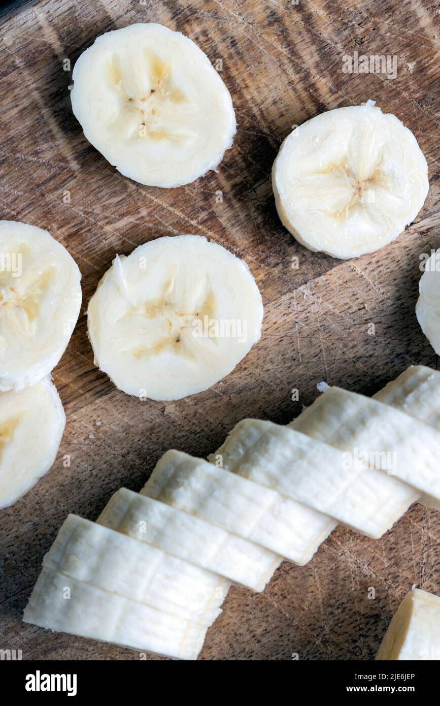 ripe yellow banana cut into pieces, food fruit banana divided into ...
