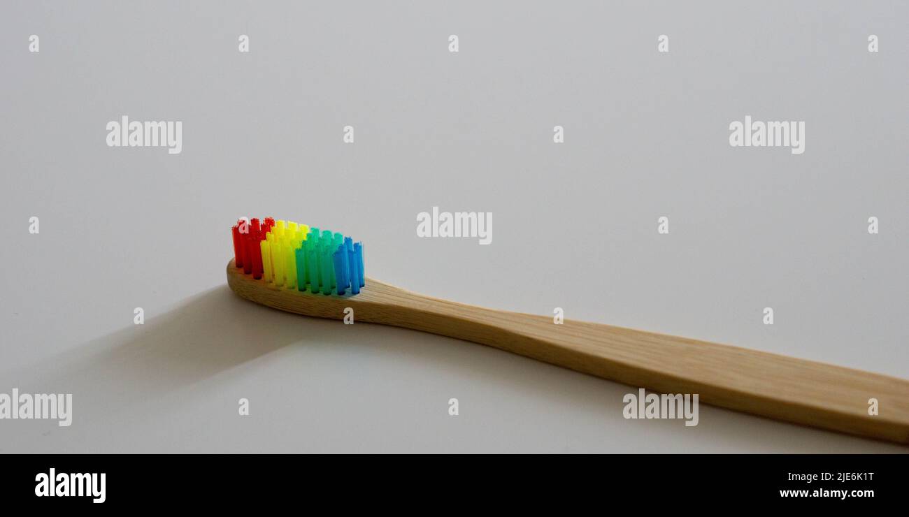 LGBT concept. Close up of a Bamboo Rainbow Dental Toothbrush Stock ...