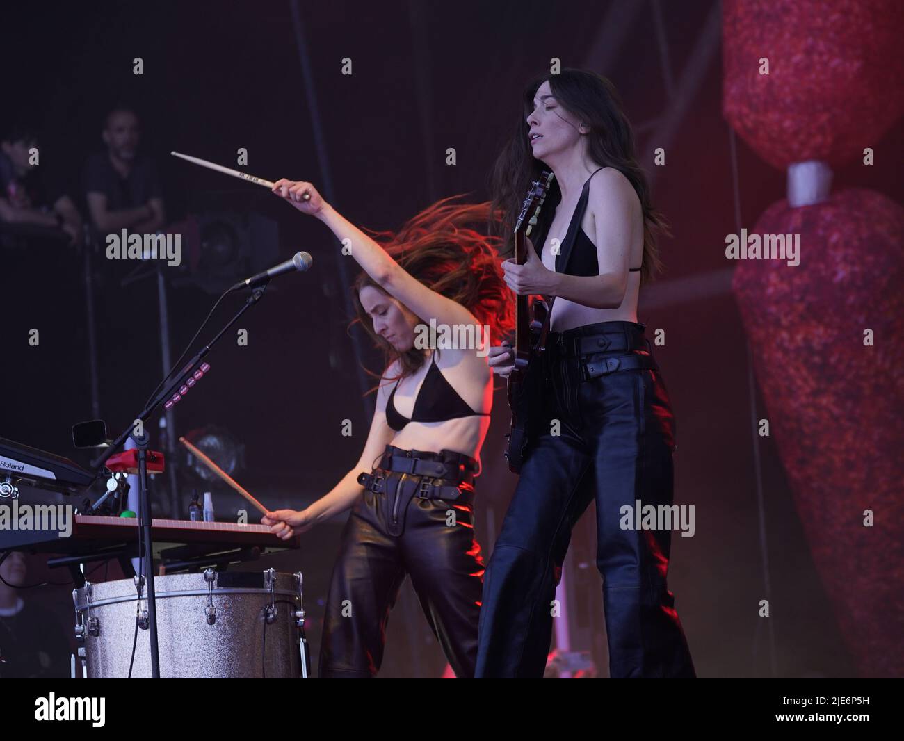 Haim performing on the Pyramid Stage during the Glastonbury Festival at ...