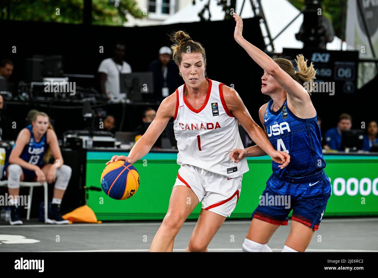 Canada's Michelle Plouffe and US' Ashley Joens pictured in action ...