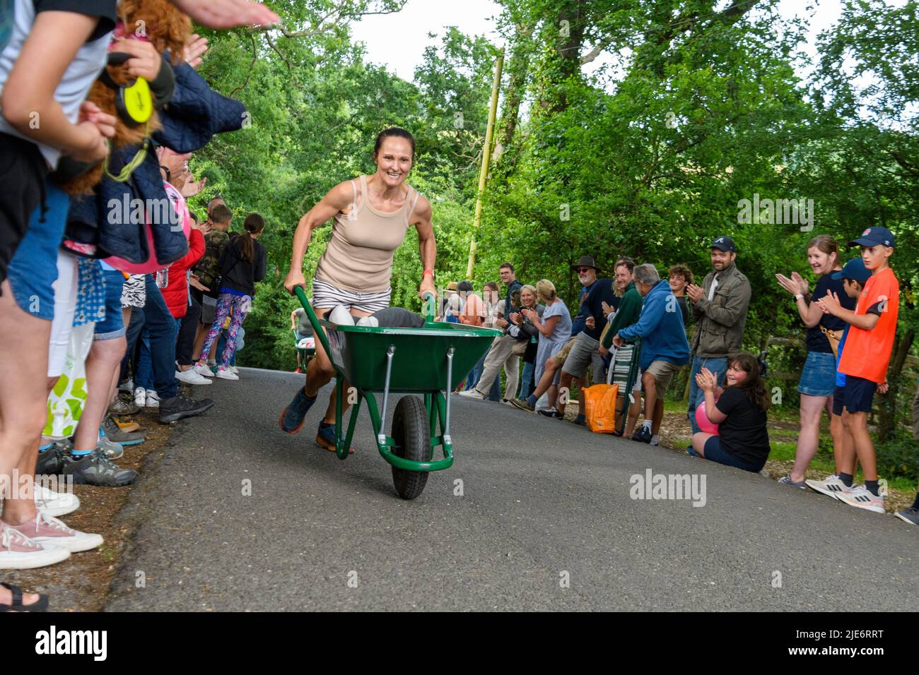 New Forest, Hampshire, UK, 25th June 2022: A competitor feels the pain ...