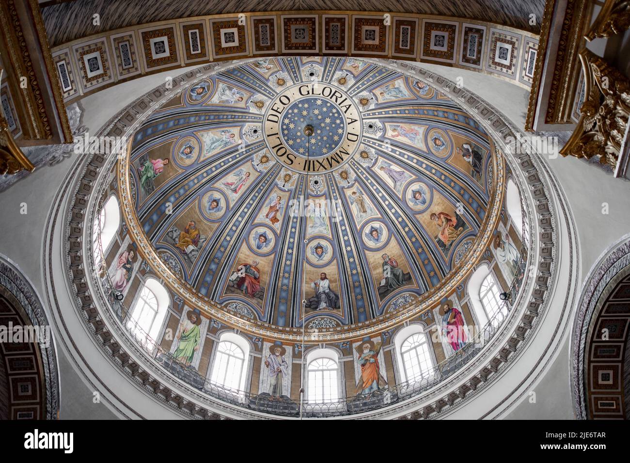 a round dome in a catholic church with painted interior Stock Photo - Alamy