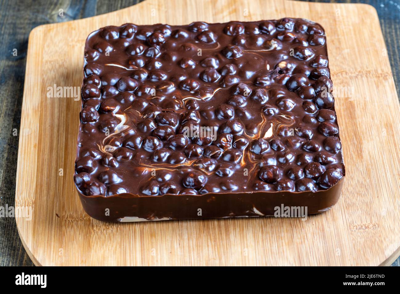 homemade chocolate with lots of hazelnuts, high-quality chocolate made ...