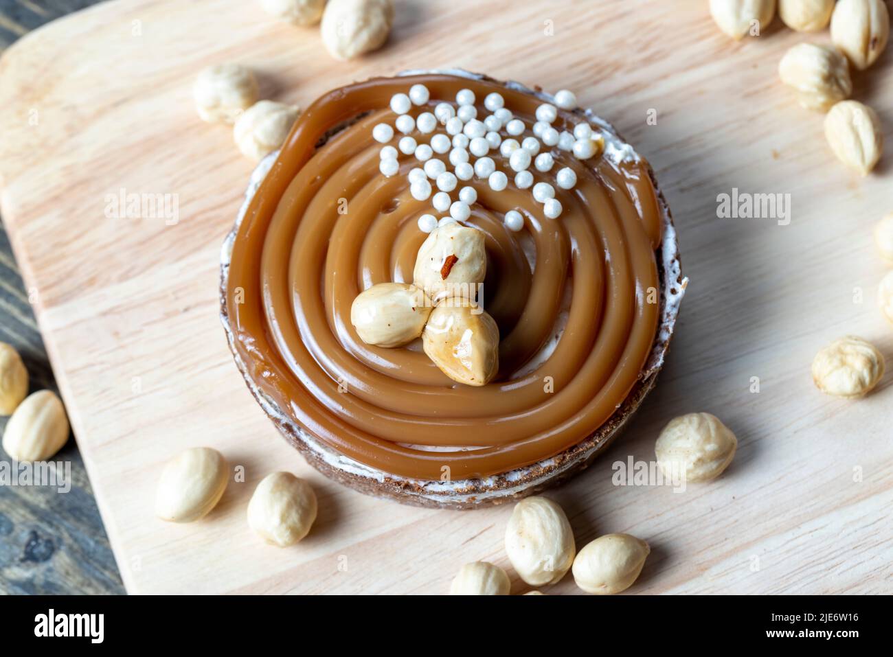 chocolate tartlet with cream filling and salted caramel with nuts ...