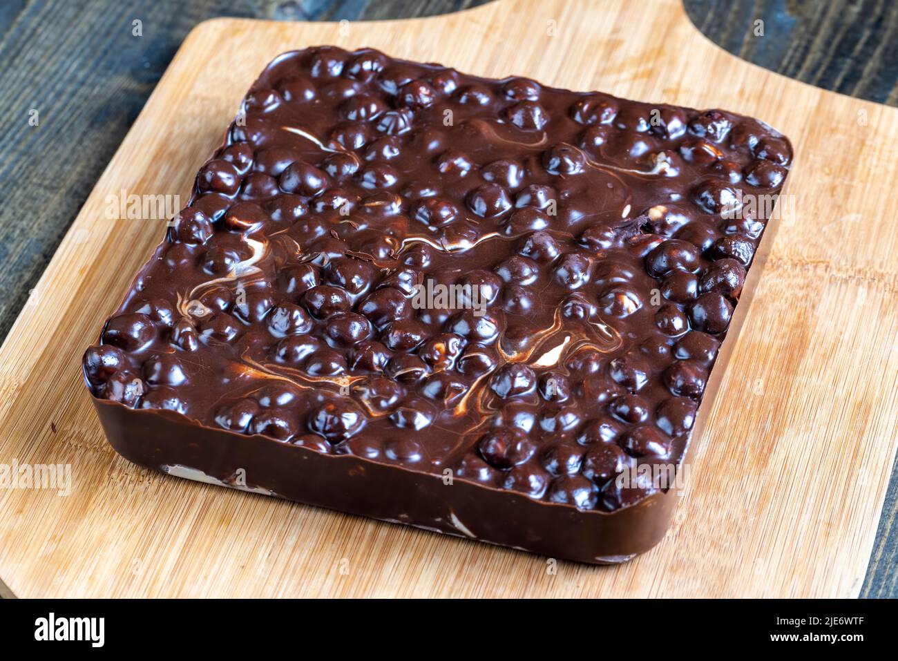 homemade chocolate with lots of hazelnuts, high-quality chocolate made ...