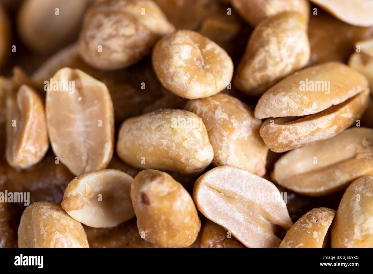 wheat fresh baguette and peanut paste, making breakfast of bread and ...