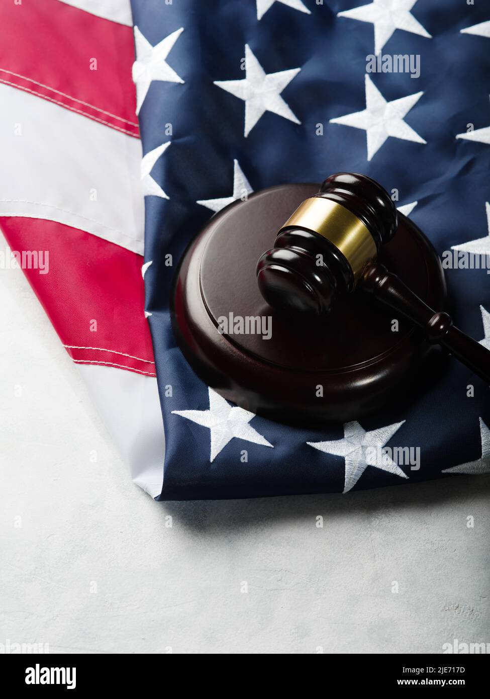 Wooden gavel of the judge on the background of the American flag. Court ...