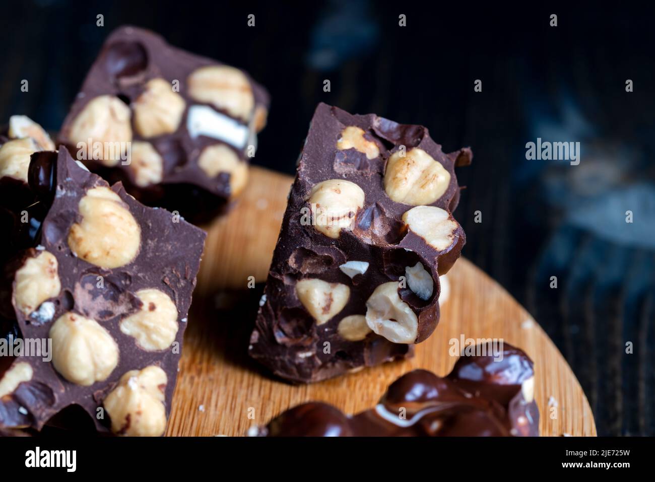 homemade chocolate with lots of hazelnuts, high-quality chocolate made ...