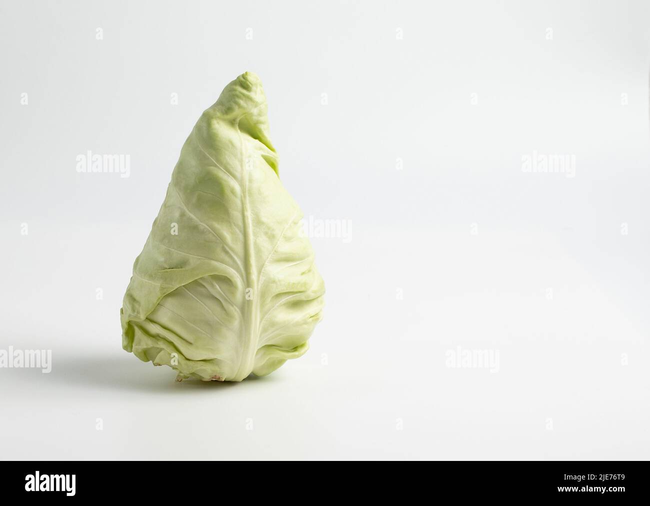 Cone head cabbage for dietary, vegan on a white background Stock Photo ...