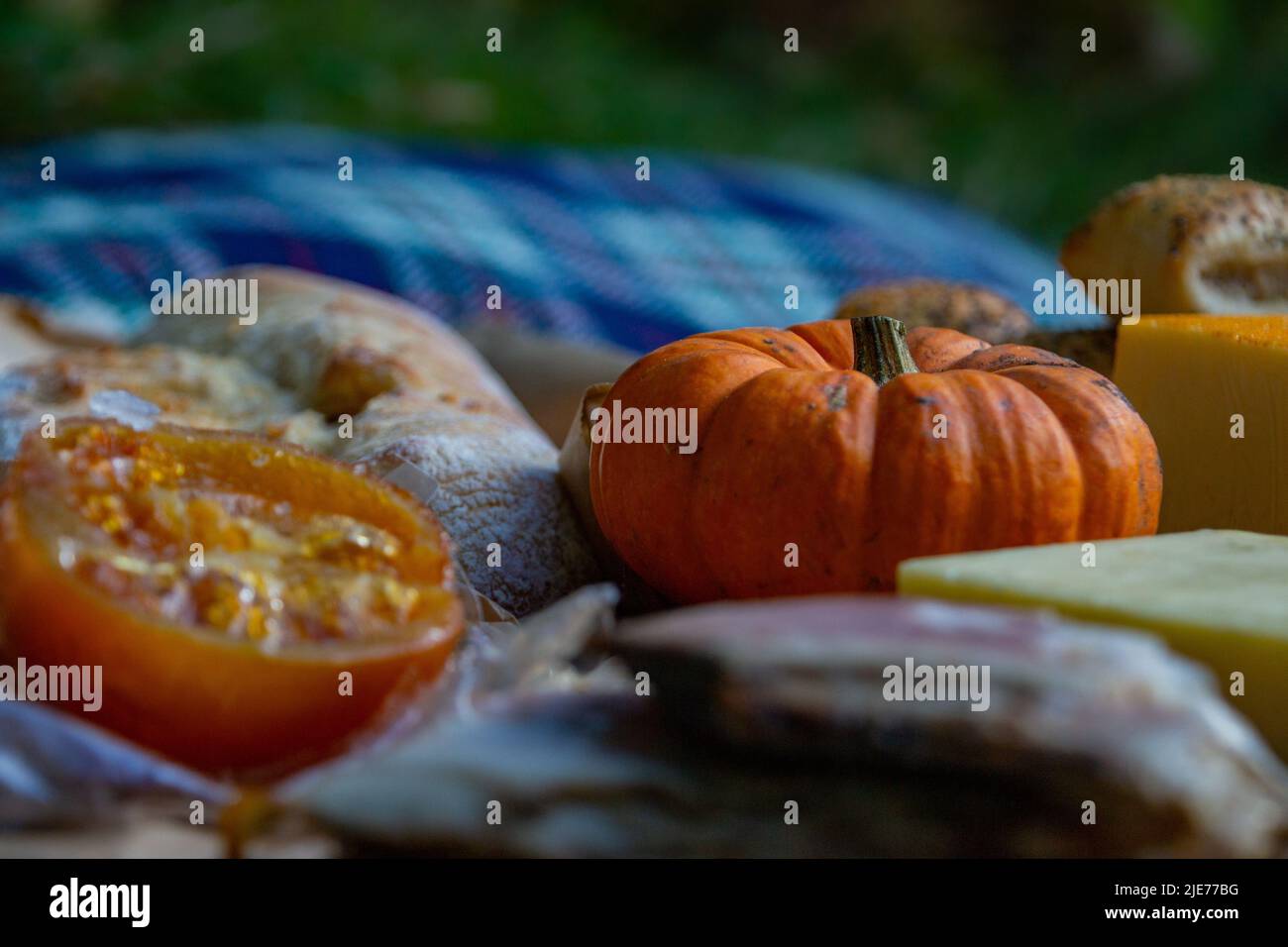 Traditional Autumnal Picnic, with Sourdough, Pumpkins and cheese, on a ...
