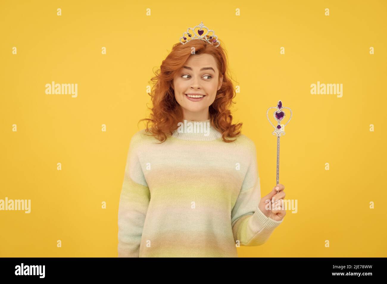 happy redhead woman in queen crown with magic wand, magic Stock Photo ...