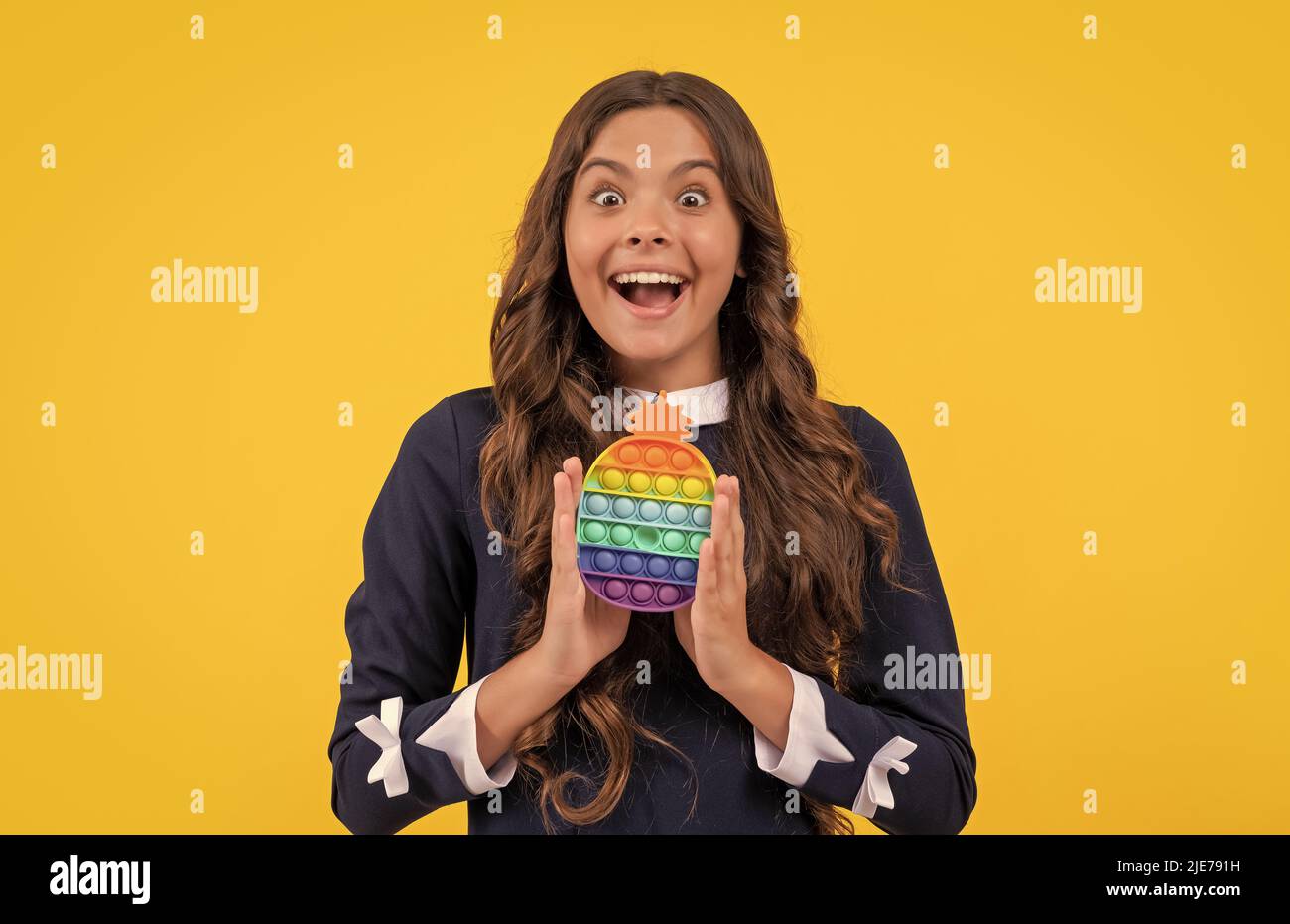 push button antistress silicone toy. sensory fidgeting. girl with ...