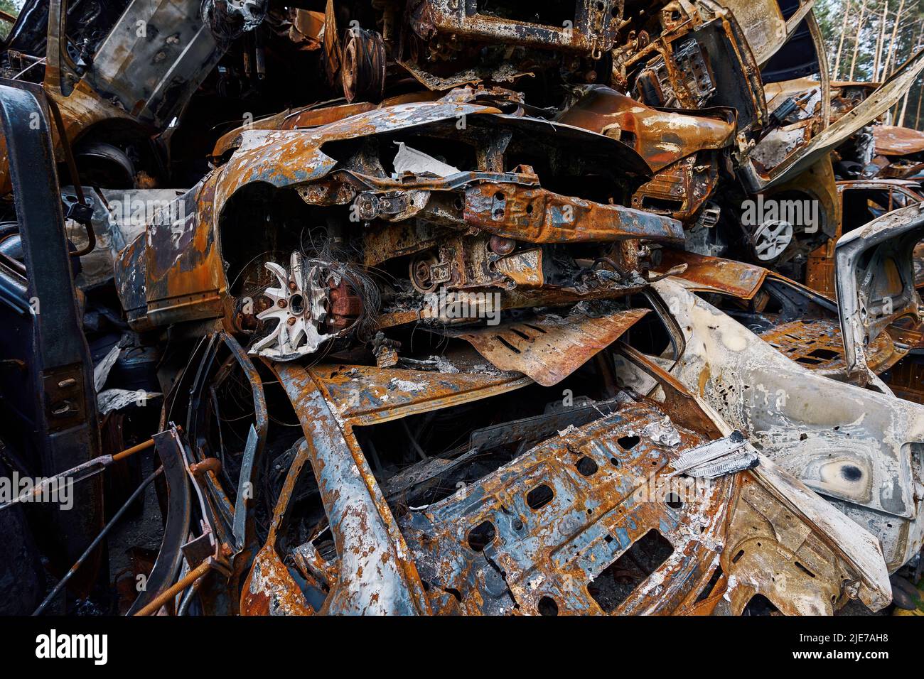 Mangled car bodies after destruction by Russian artillery in Ukraine ...
