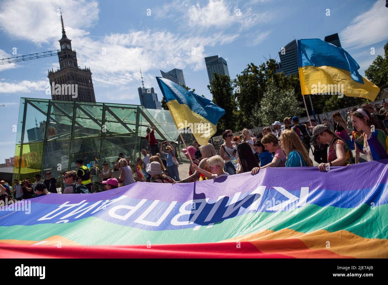 Warsaw, Poland. 25th June, 2022. People hold rainbow and Ukrainian ...