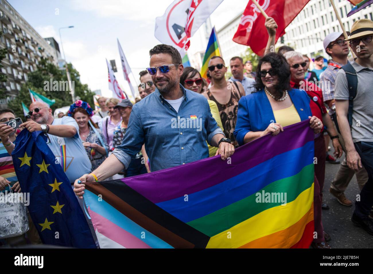 Mayor of Warsaw, Rafal Trzaskowski holds a rainbow flag during the ...