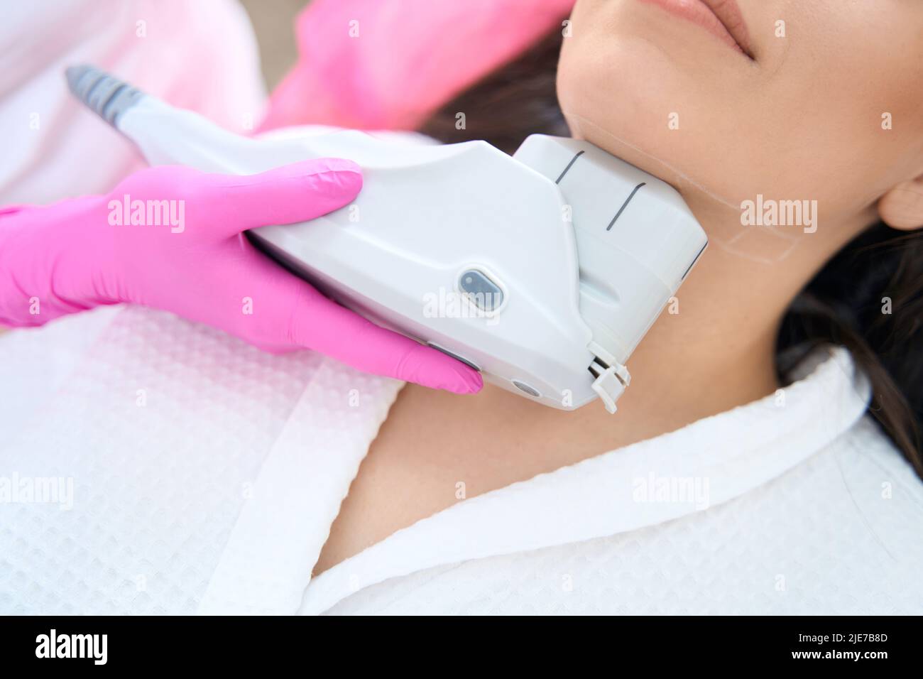Skin tightening procedure with ultrasonic lifting device Stock Photo ...