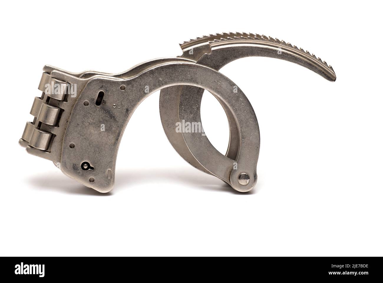 Close up of solid iron metal steel handcuffs with rigid solid fixed ...