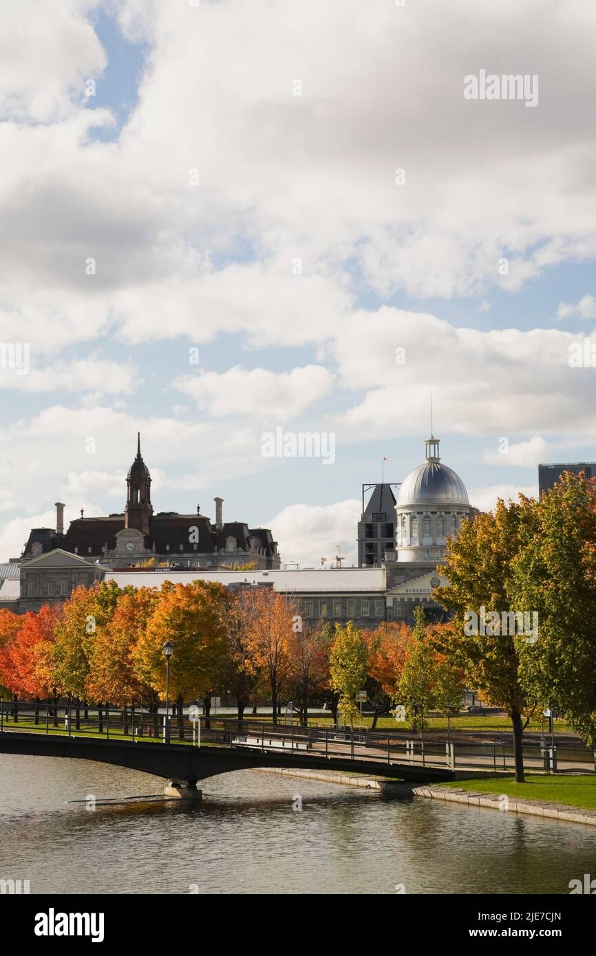 Footbridge over Bonsecours basin with Montreal City hall and Bonsecours ...