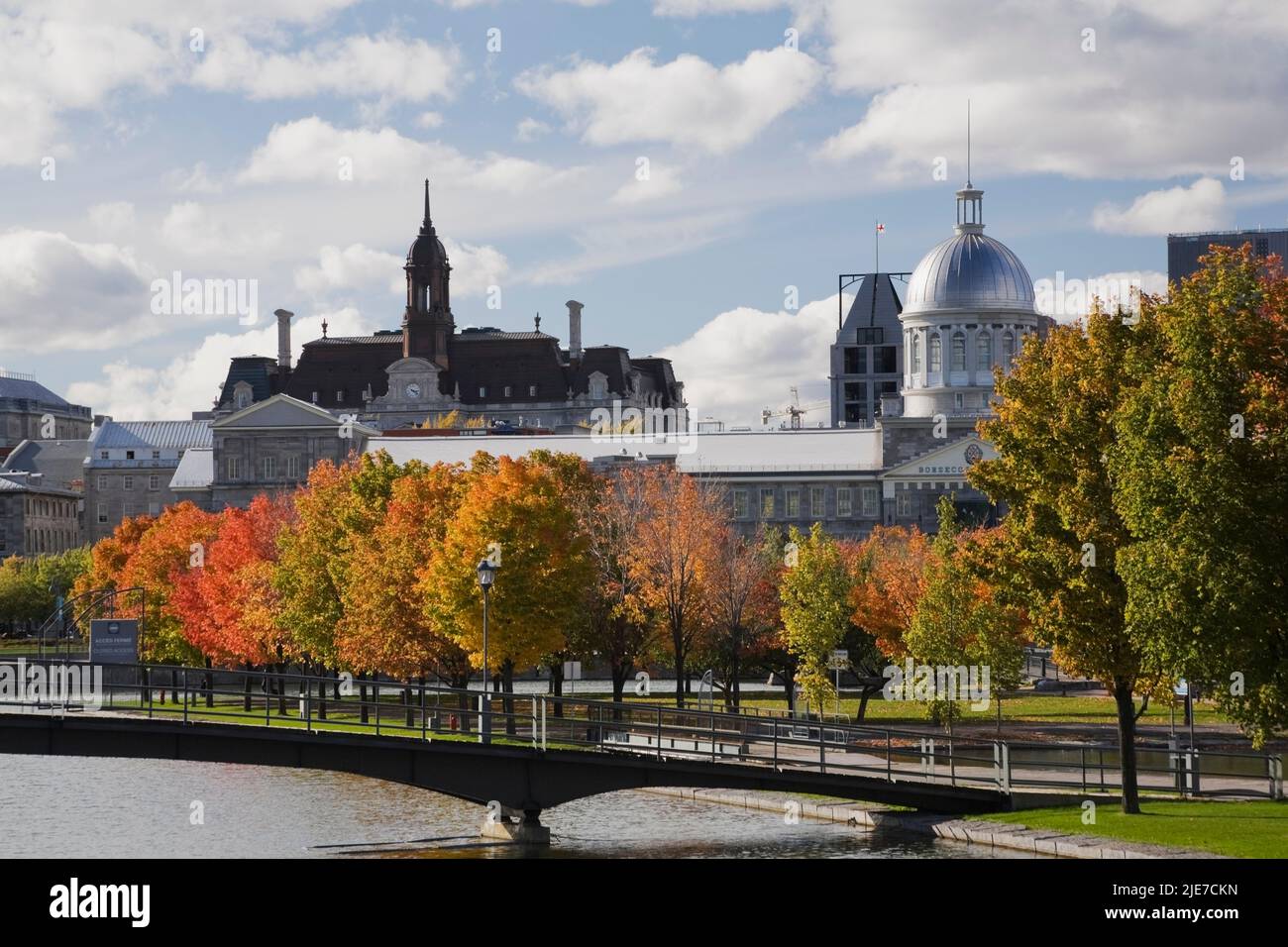 Footbridge over Bonsecours basin with Montreal City hall and Bonsecours ...