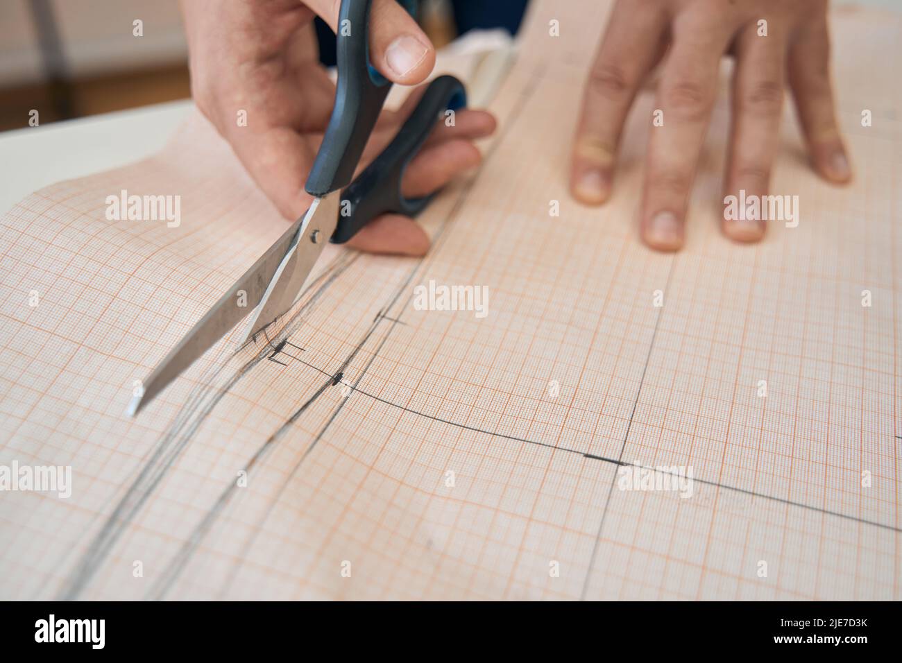 Dressmaker making patterns for sewing handmade clothes Stock Photo - Alamy